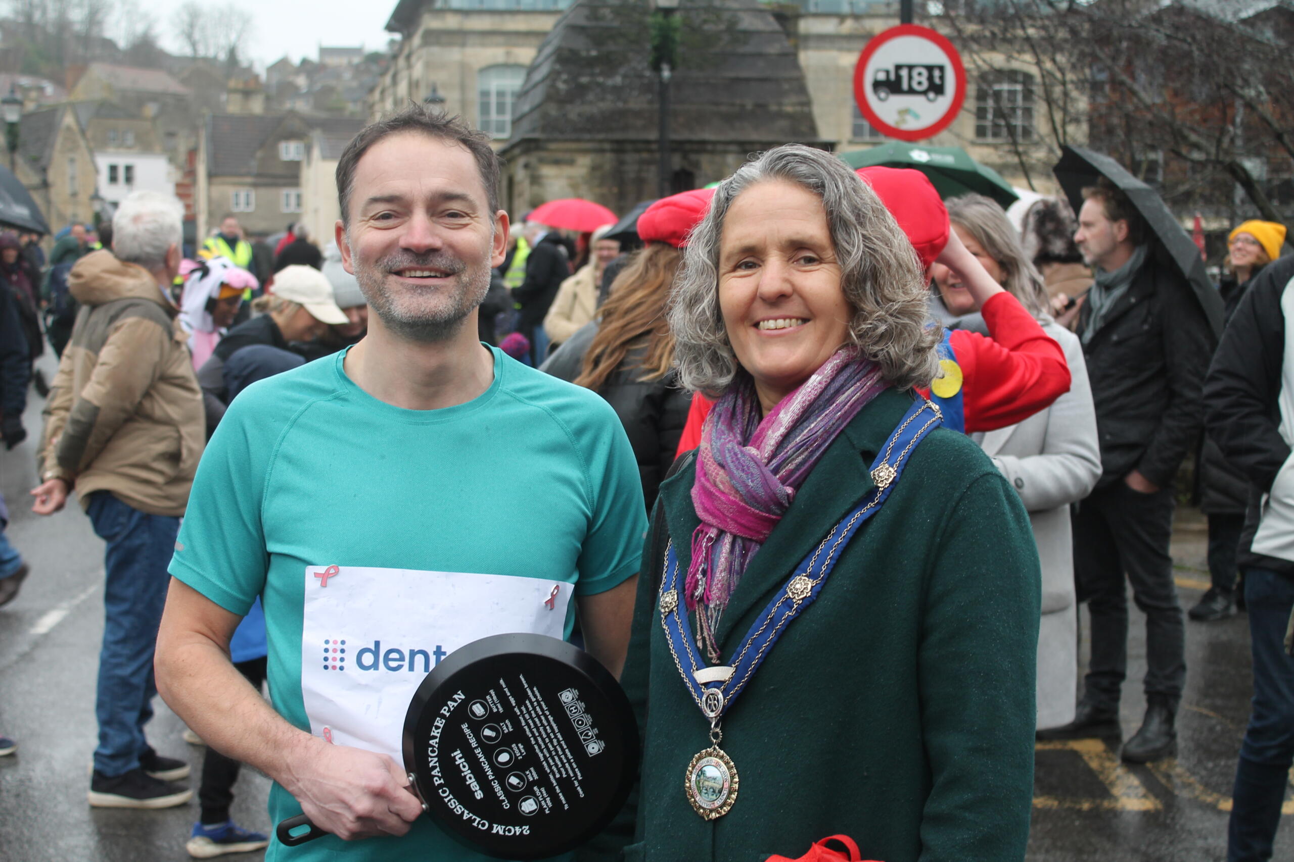 Dentist smiling at Bradford on Avon’s 2024 pancake race - Bradford-on ...
